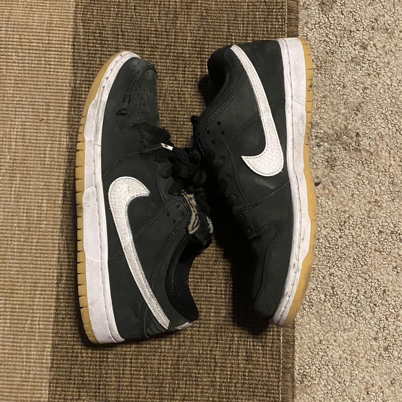 Nike SB Dunks Skated Size Mens 7 Black And White - Depop