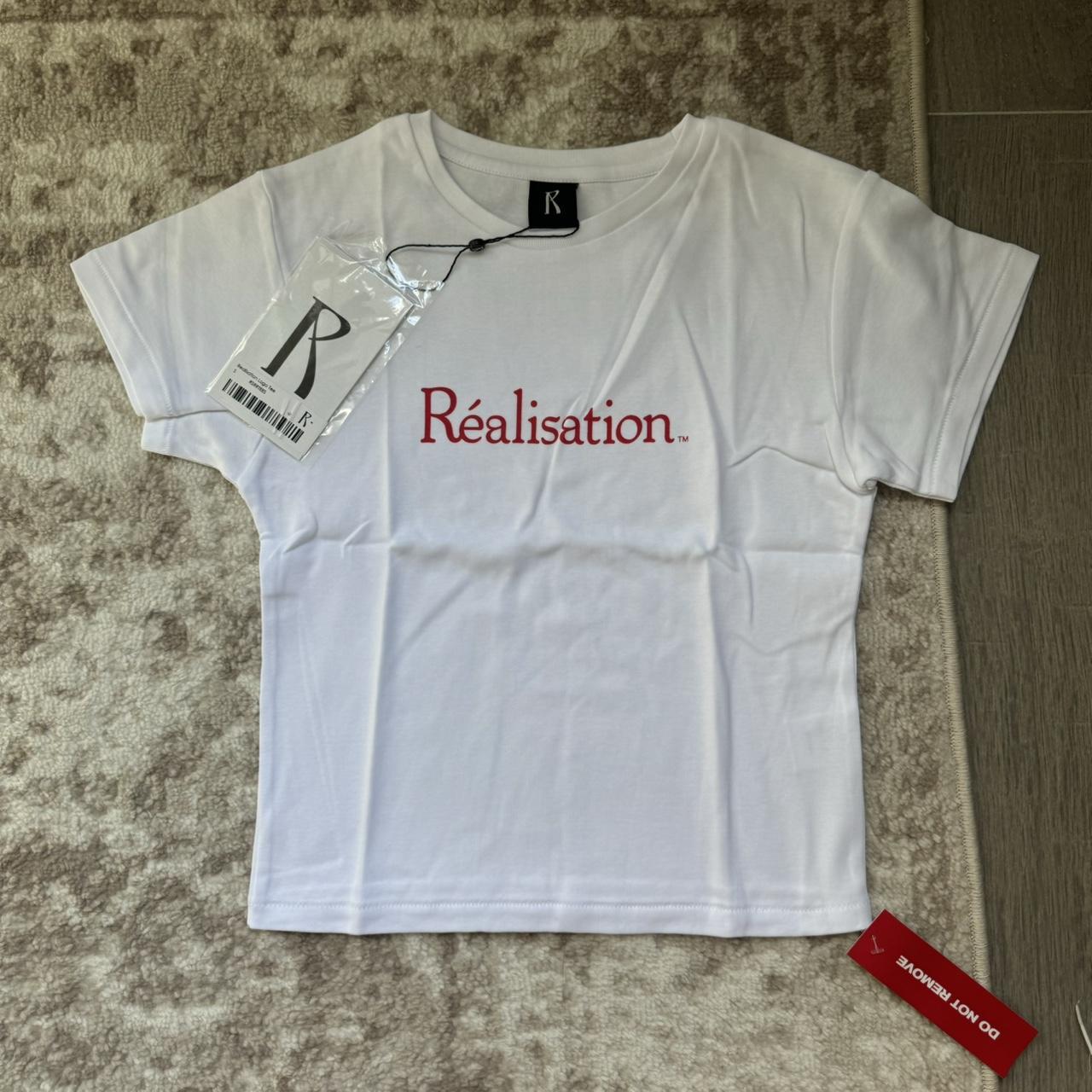 Realisation par logo baby tee - brand new with tags - Depop