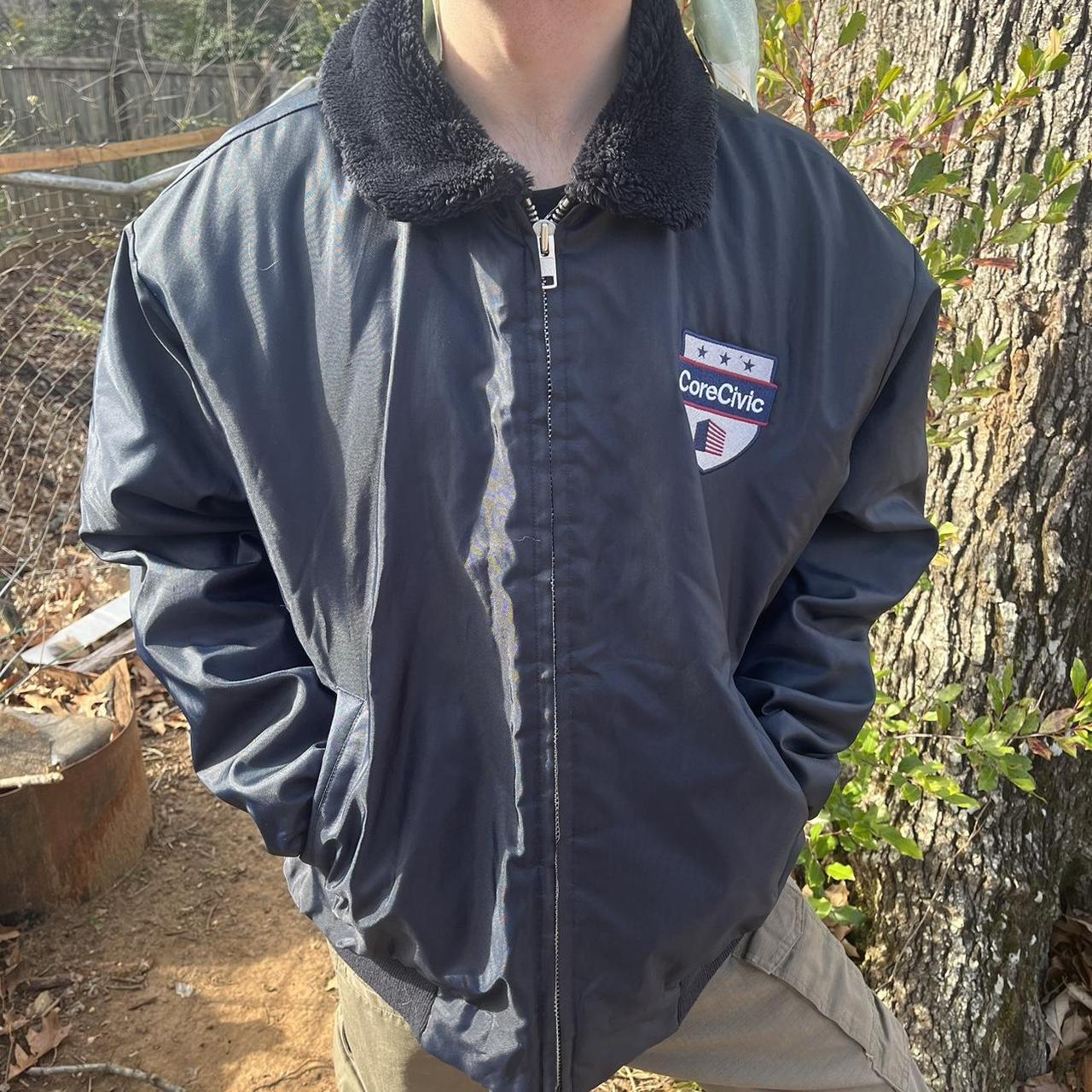 CoreCivic Bomber Jacket Marked as an XL by brand... - Depop