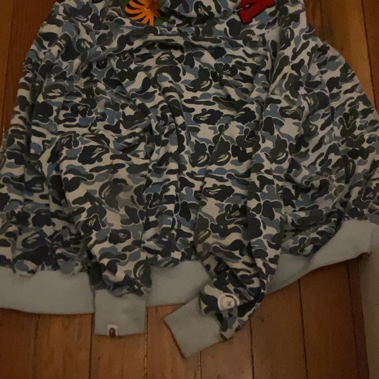 Light blue bape hoodie Msg me before buying Fits... - Depop