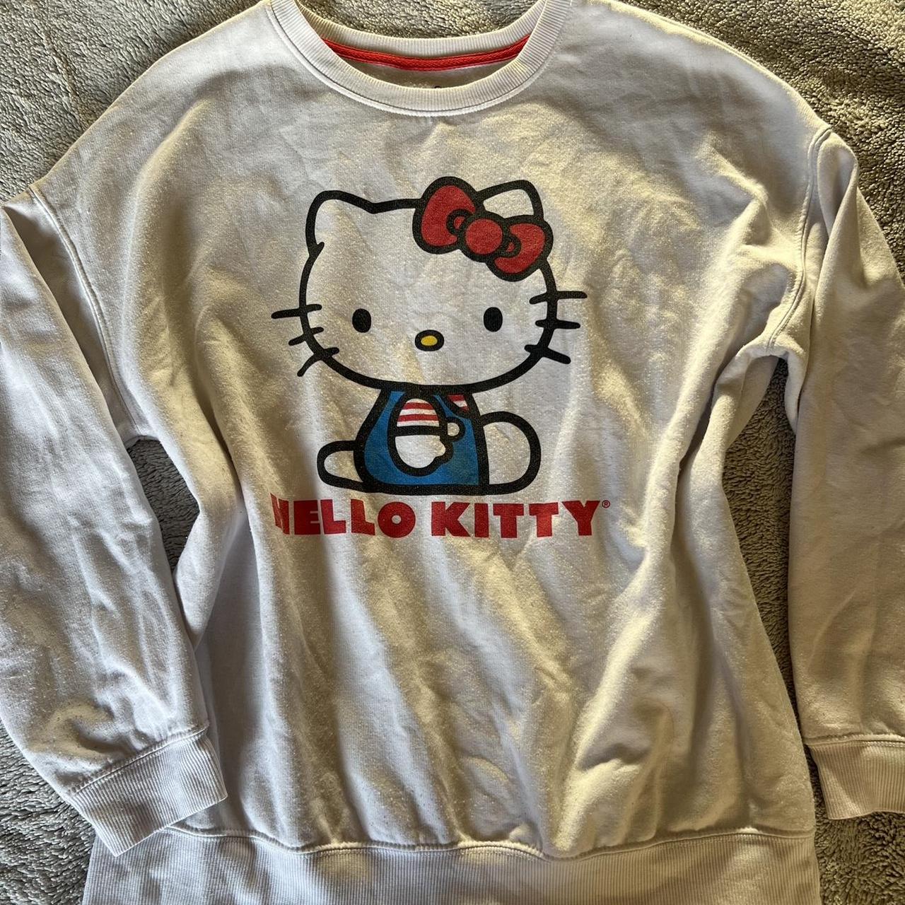 Hello kitty white crew neck - kind of faded - size... - Depop