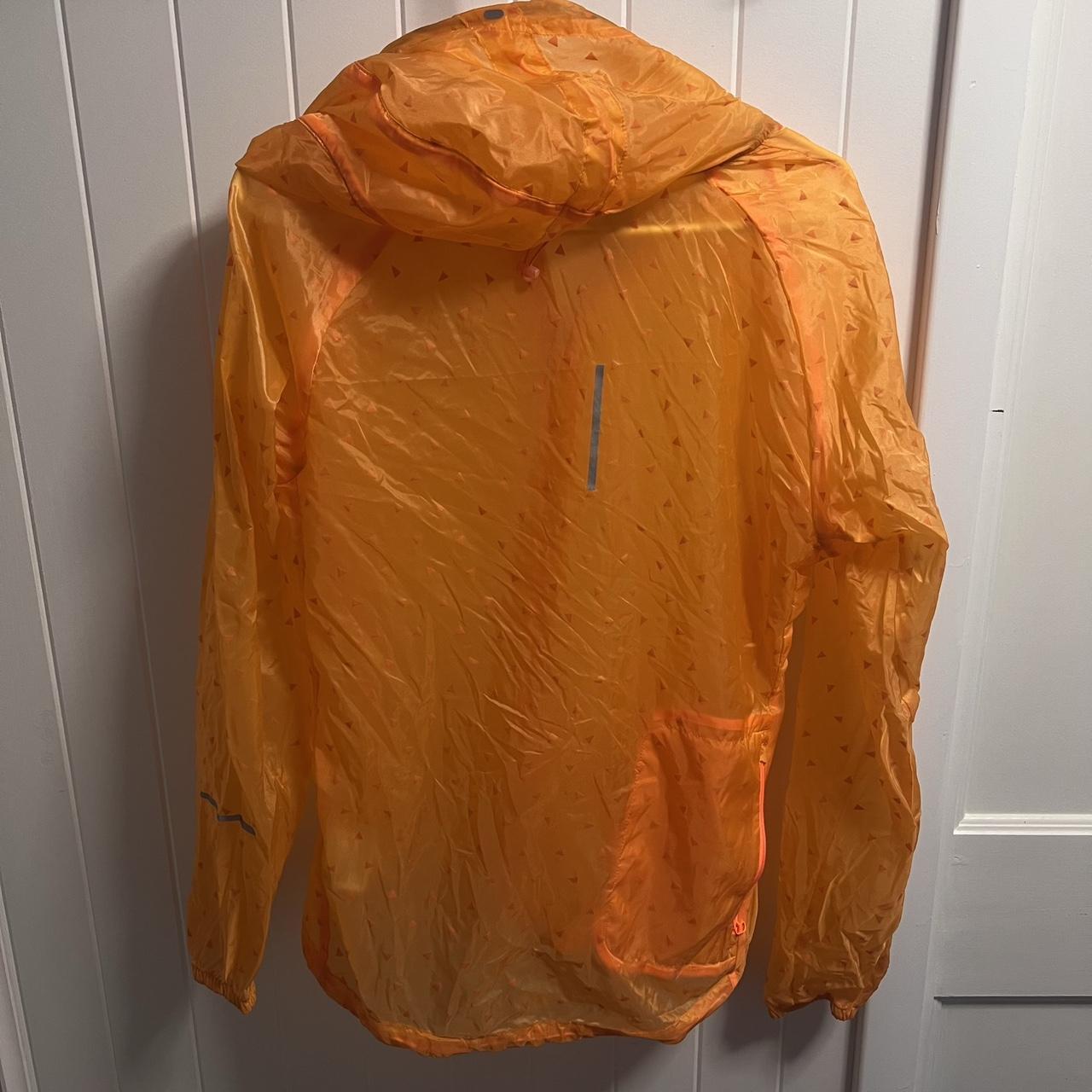 Nike running, neon orange light weight rain... - Depop