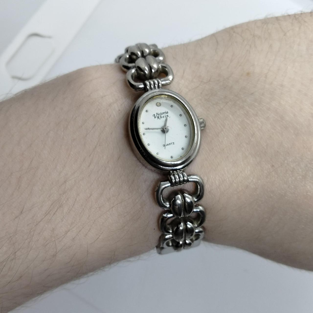 Women's silver tone quartz movement stretch band... - Depop