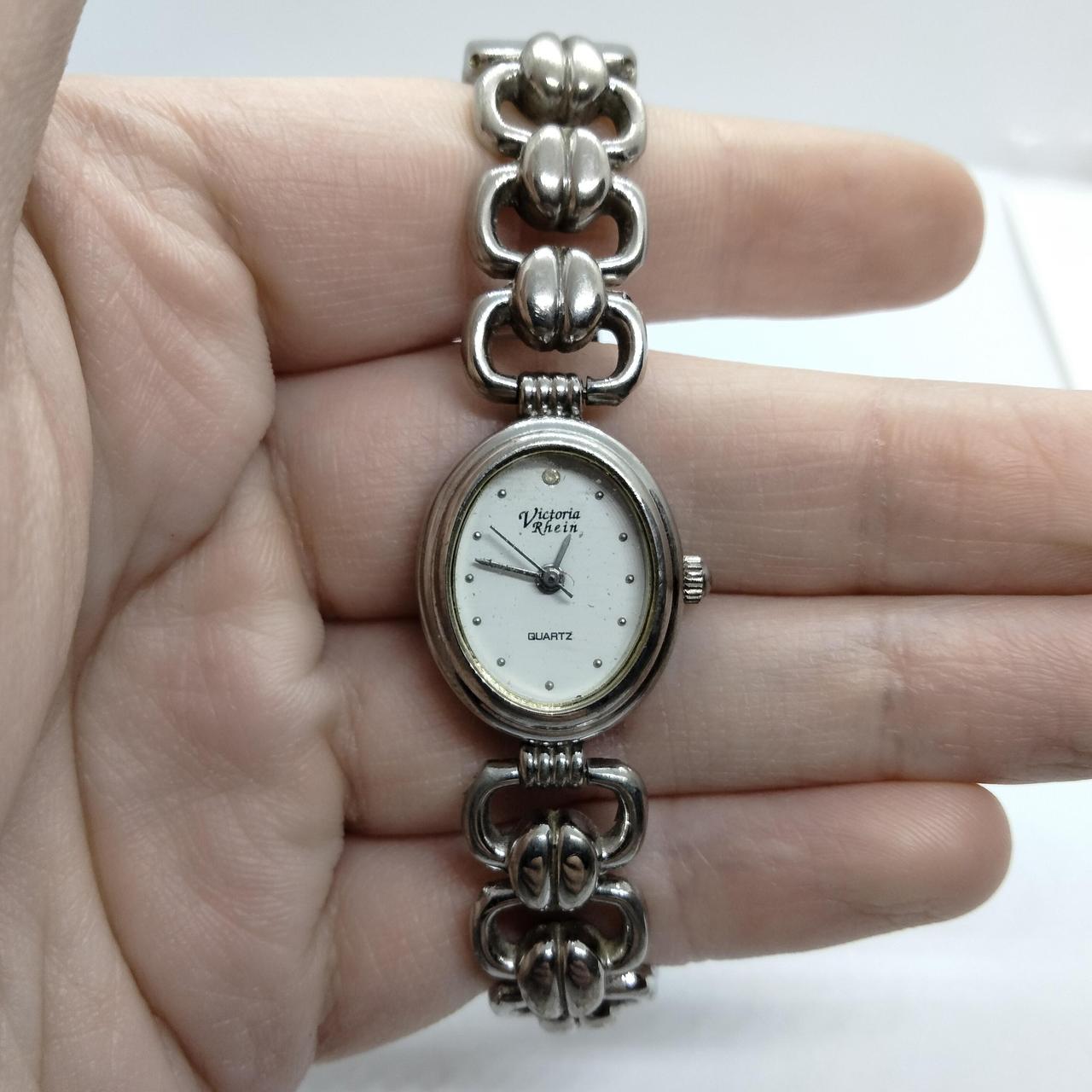 Women's silver tone quartz movement stretch band... - Depop