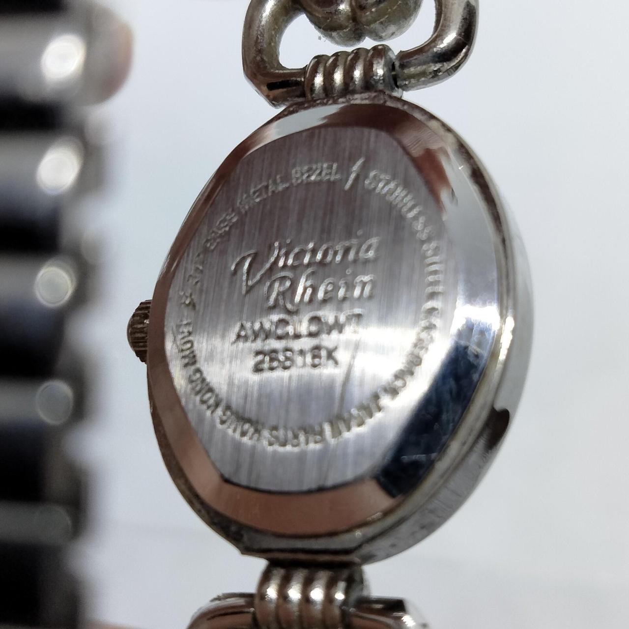 Women's silver tone quartz movement stretch band... - Depop