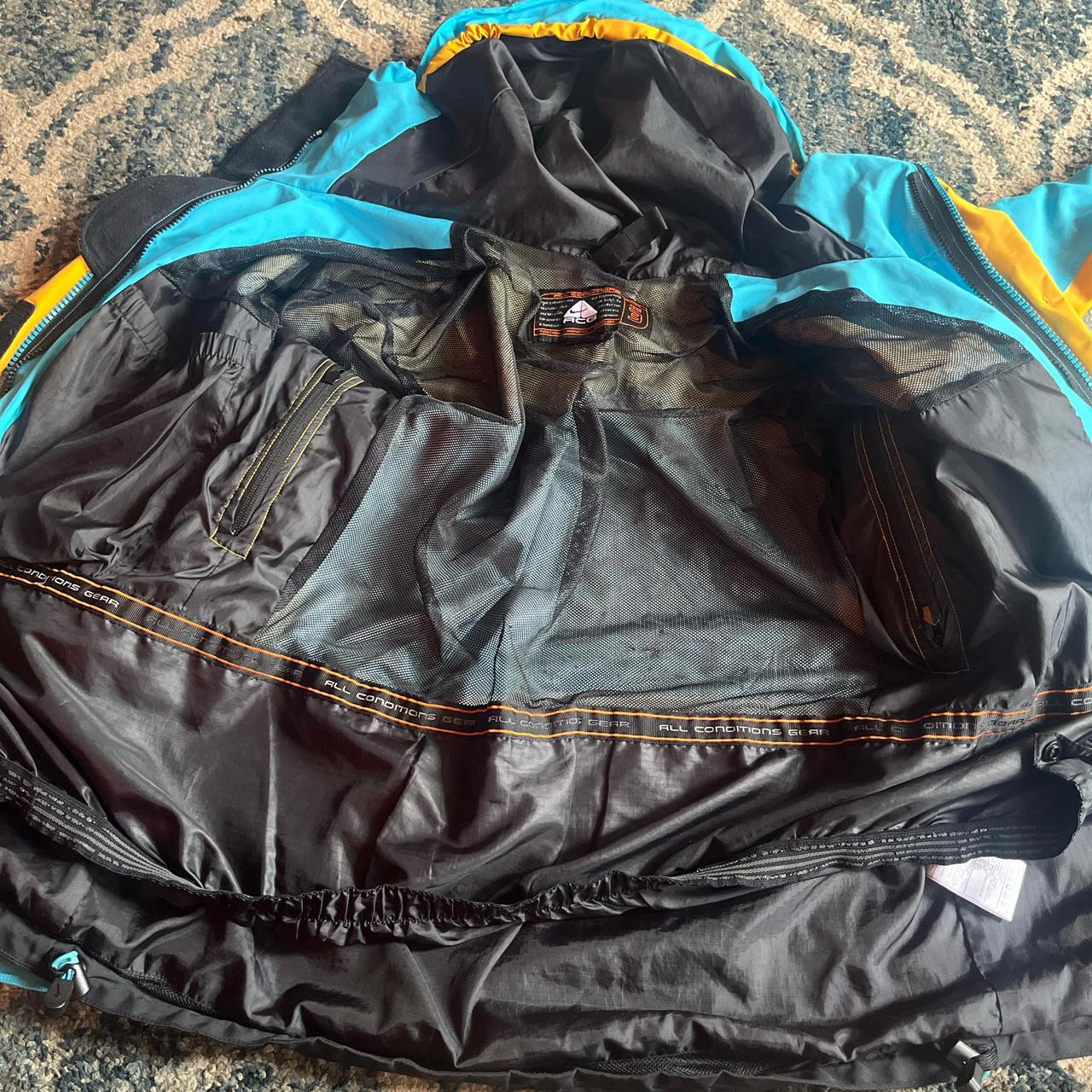 Blue and yellow Nike ski jacket - Depop