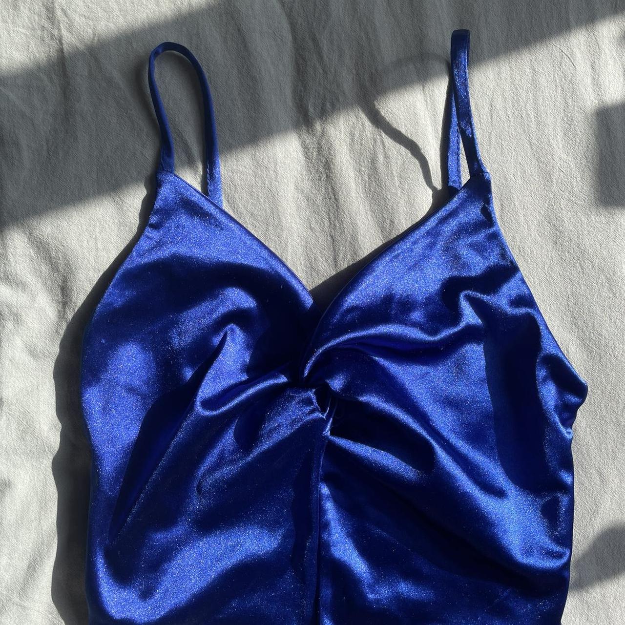 Supre blue shiny top, Size small, little bit of... - Depop