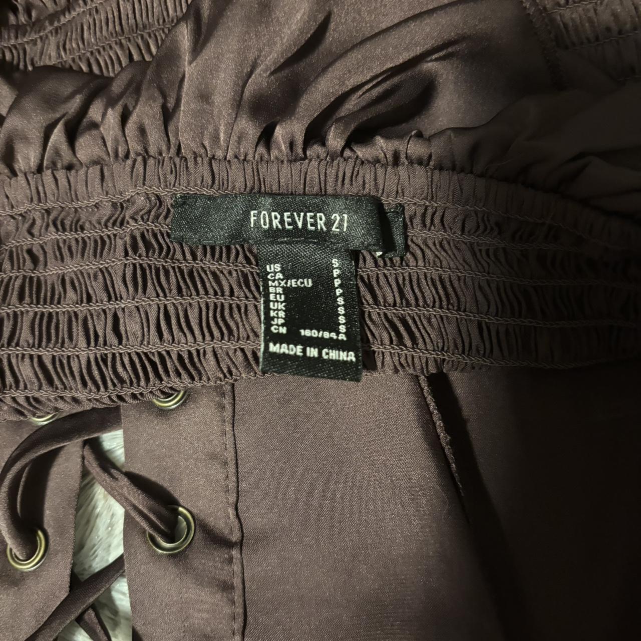 Dark purple strapless top with ruffles, type of... | Depop