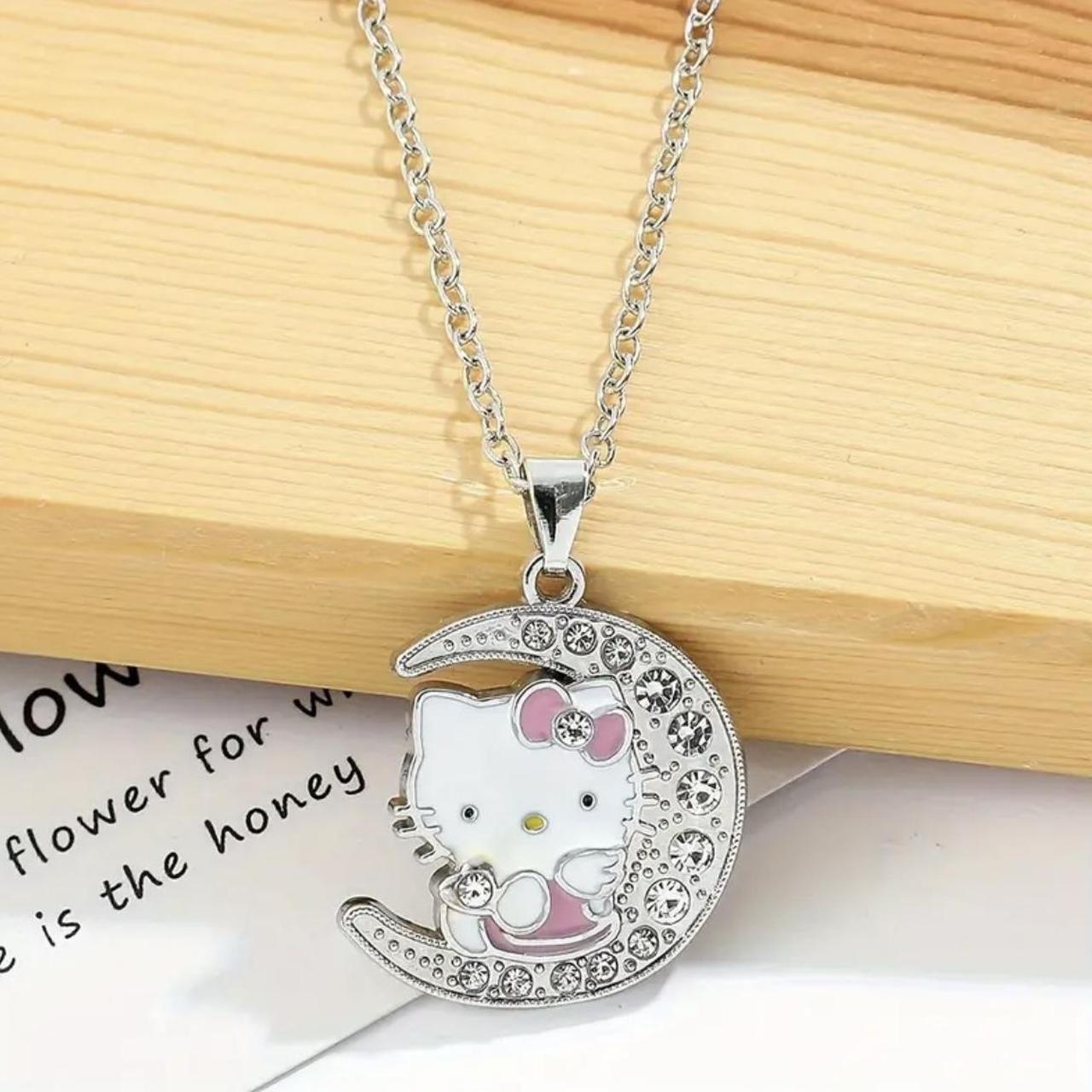 Hello Kitty silver necklace with rhinestone moon... - Depop