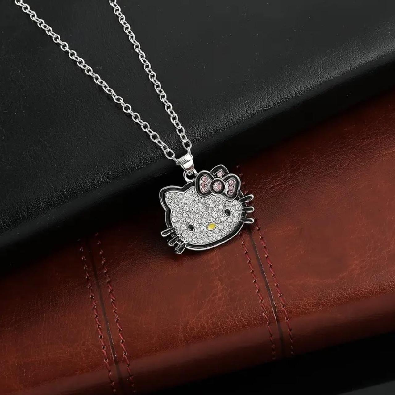 Hello Kitty silver tone necklace with rhinestone... - Depop