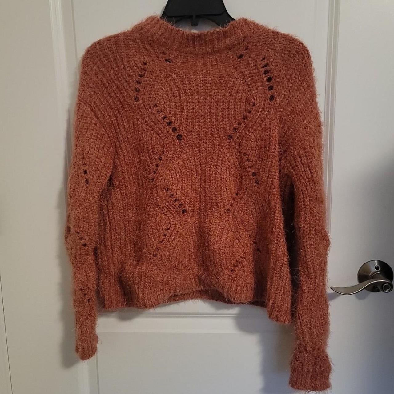 This is a soft Coral colored sweater from Freshman... - Depop