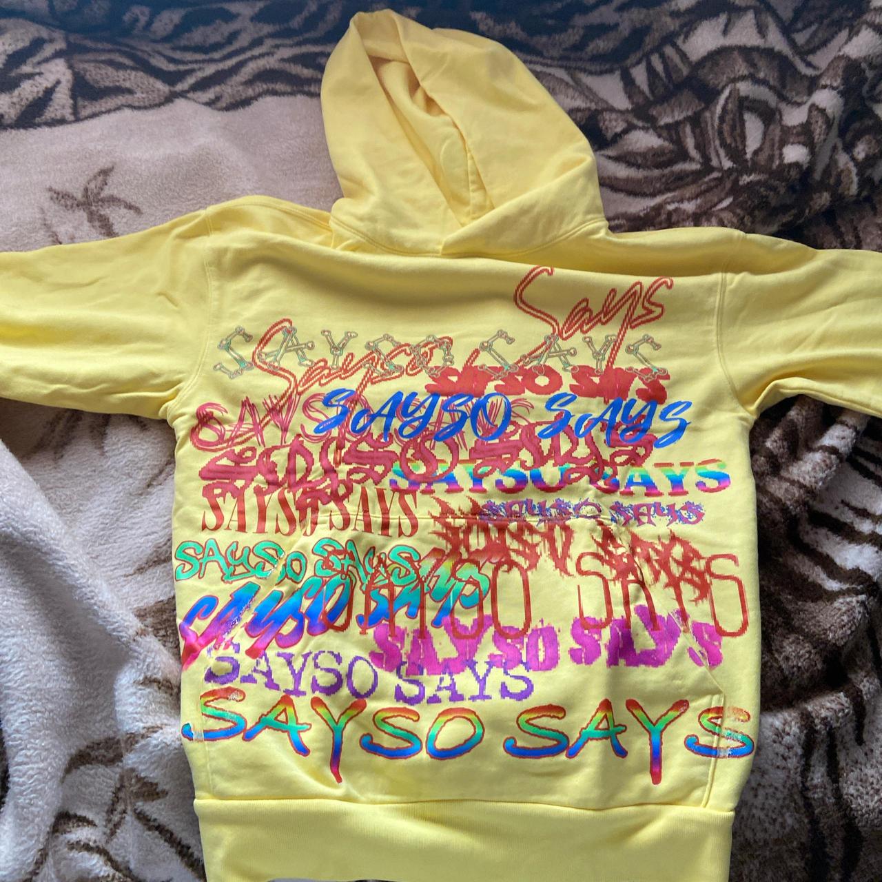 yellow praiseche sayso says hoodie looking to trade... - Depop