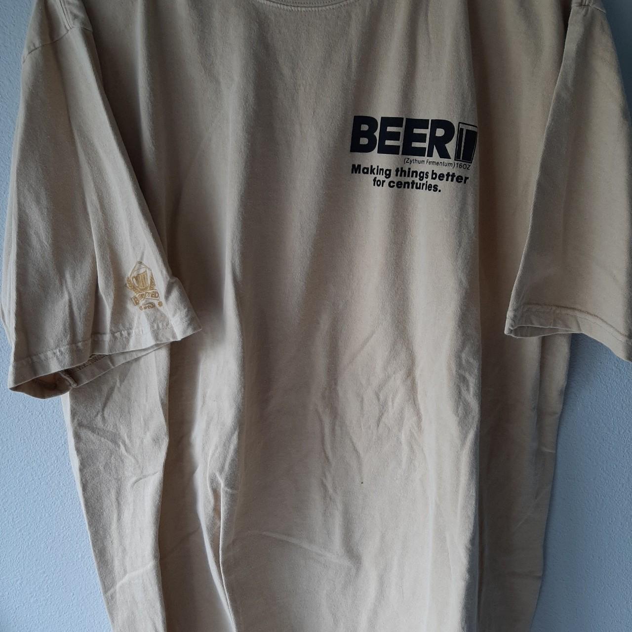 Beer tan graphic t-shirt. size XL measures 23 inches... - Depop