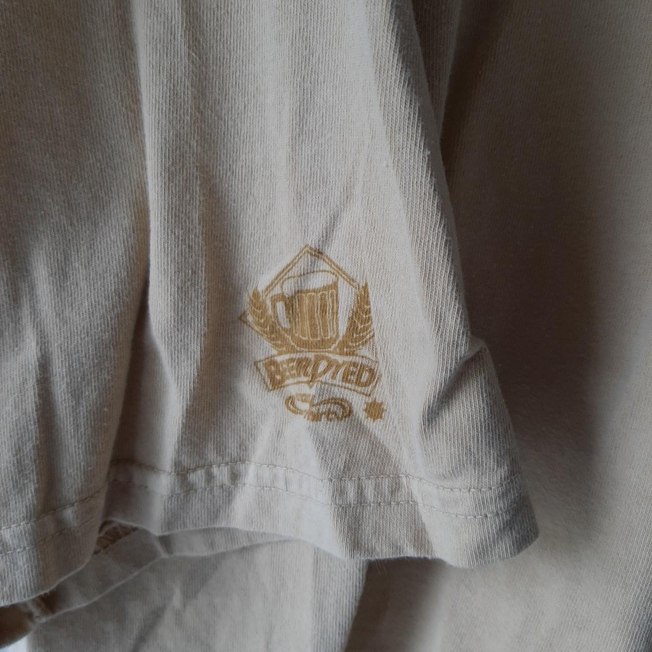 Beer tan graphic t-shirt. size XL measures 23 inches... - Depop