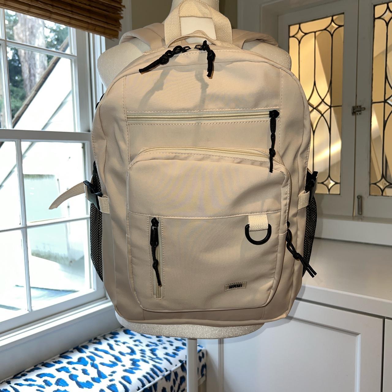 MRMI cream color backpack with black trim detail.... - Depop
