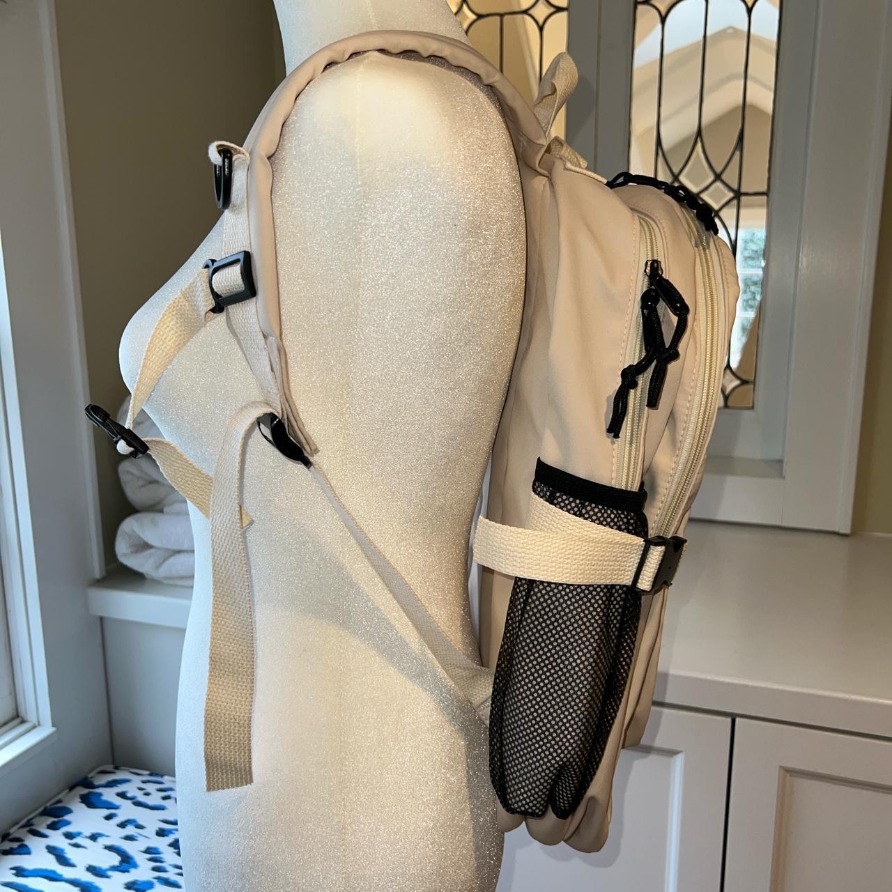 MRMI cream color backpack with black trim detail.... - Depop