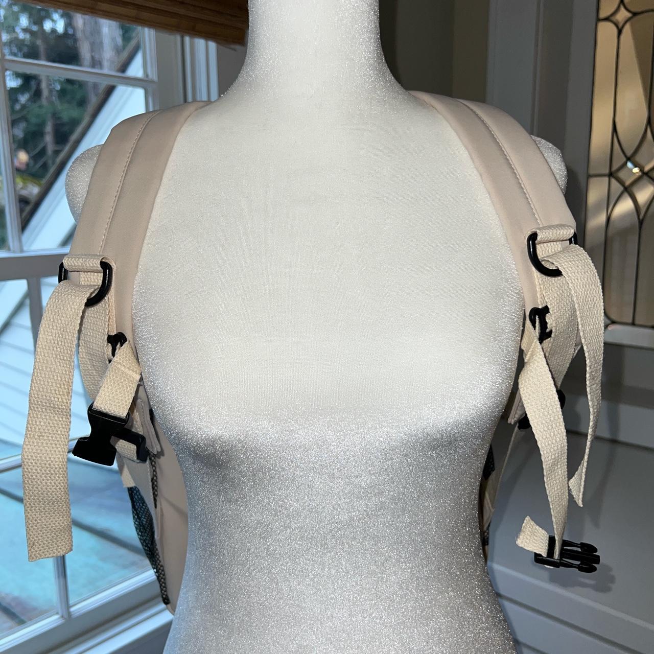 MRMI cream color backpack with black trim detail.... - Depop
