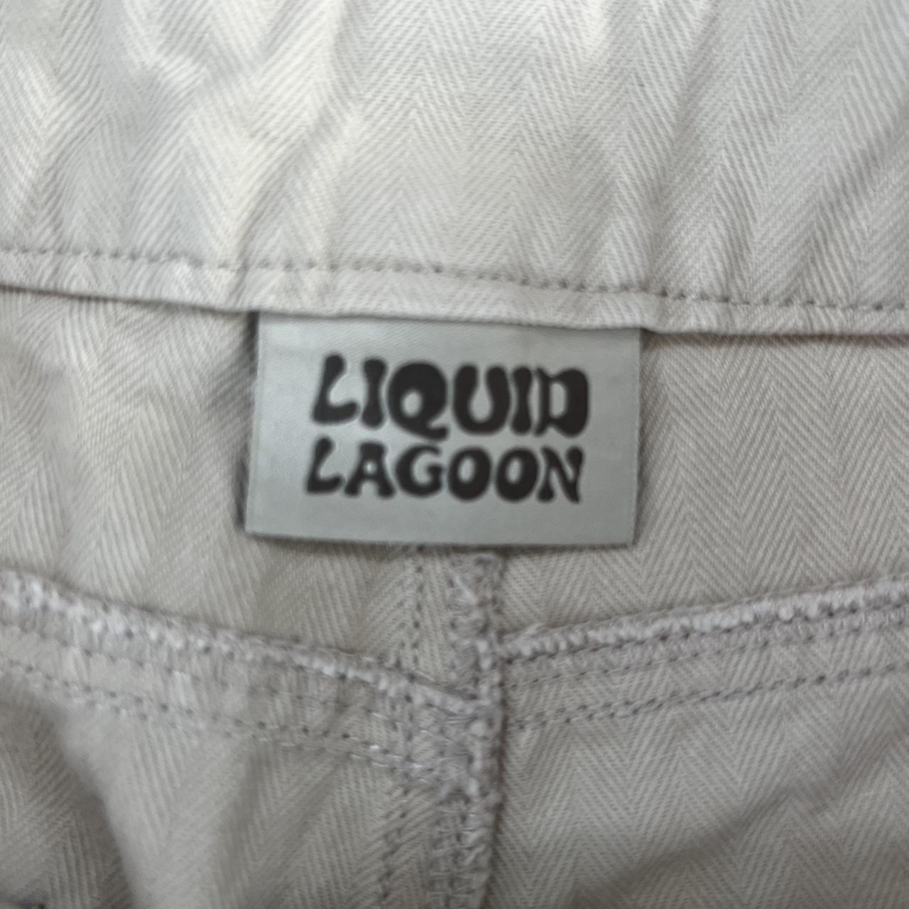liquid lagoon double knees v2 size 30/33 almost... - Depop