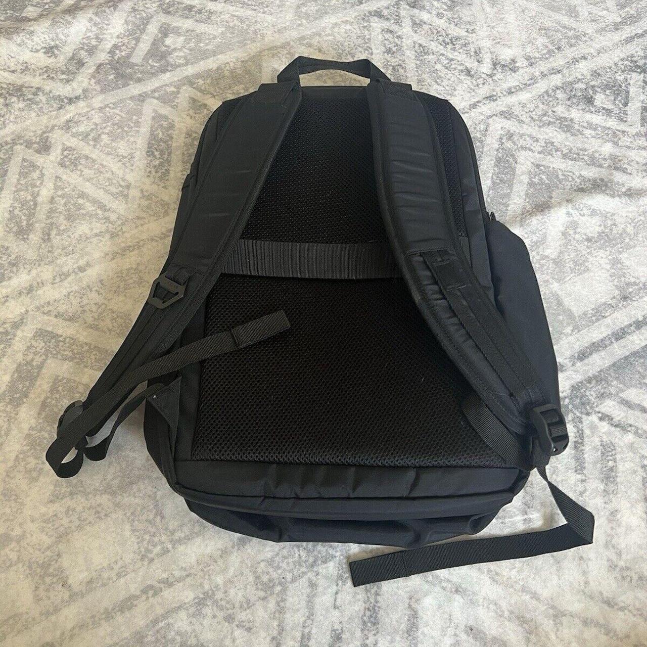 A mid-sized backpack thats fully loaded with... - Depop
