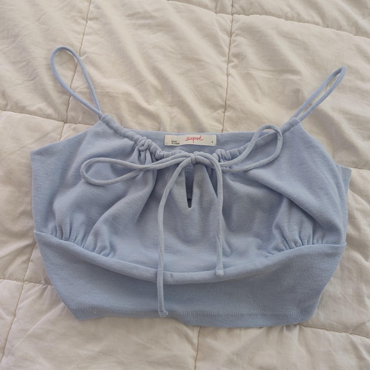 Blue supre crop top with adjustable front tie... | Depop