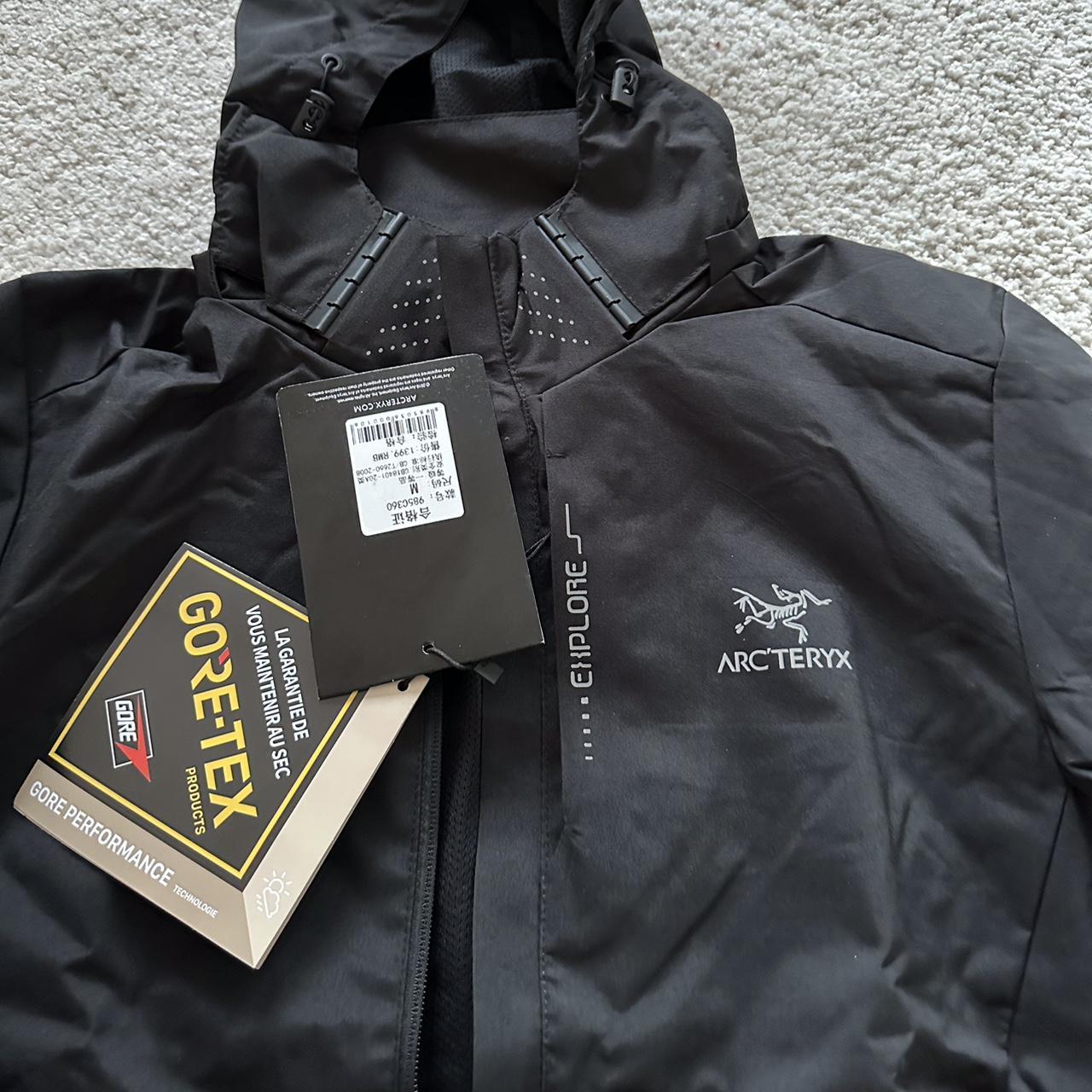 Arcteryx black hooded jacket size M but fits small... - Depop