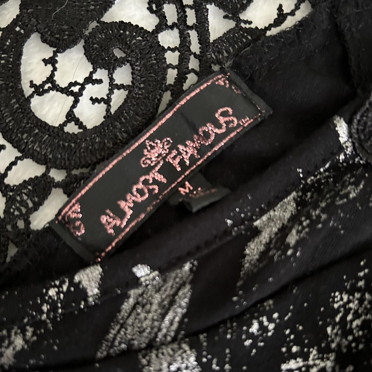 Almost Famous brand Black and metalic silver ruffle... - Depop