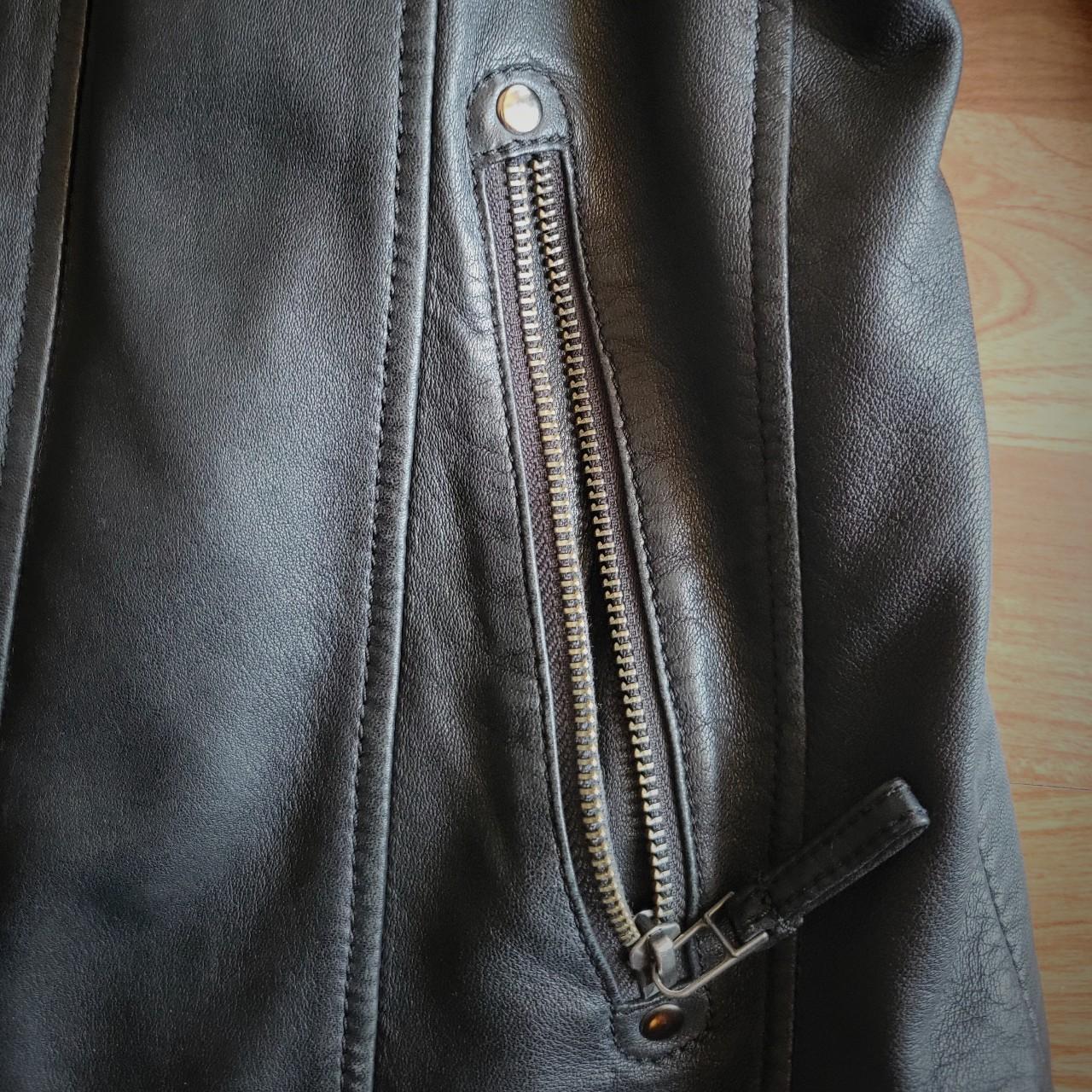 Black leather jacket. Zip up pockets, buckle detail. - Depop