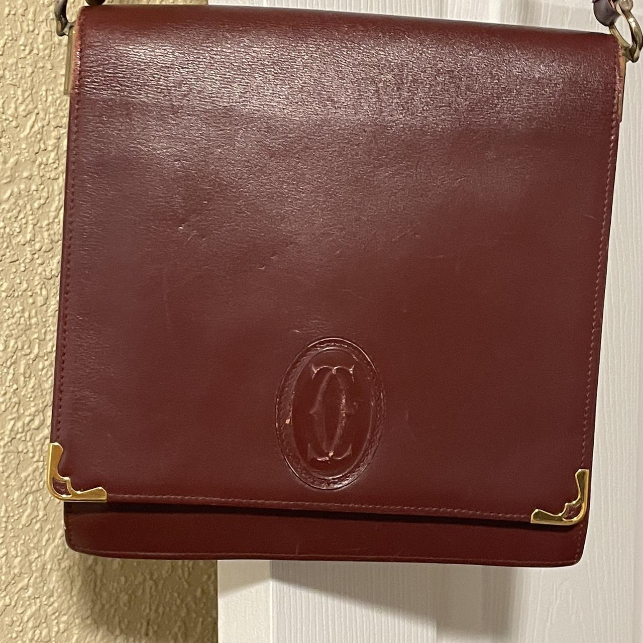 Nice Cartier purse has a few scratches on back of... - Depop