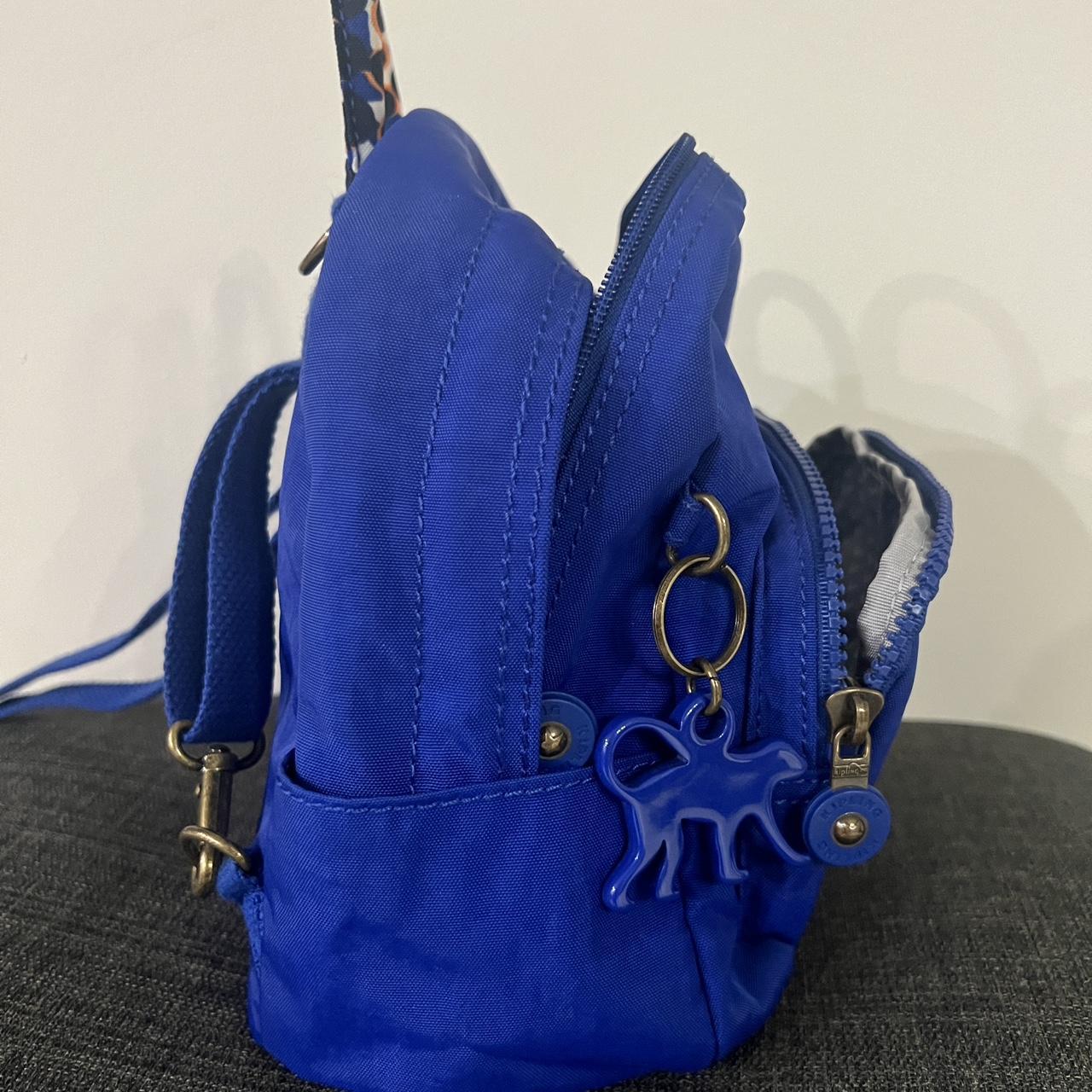 Kipling Blue Mini Backpack. Condition is... - Depop