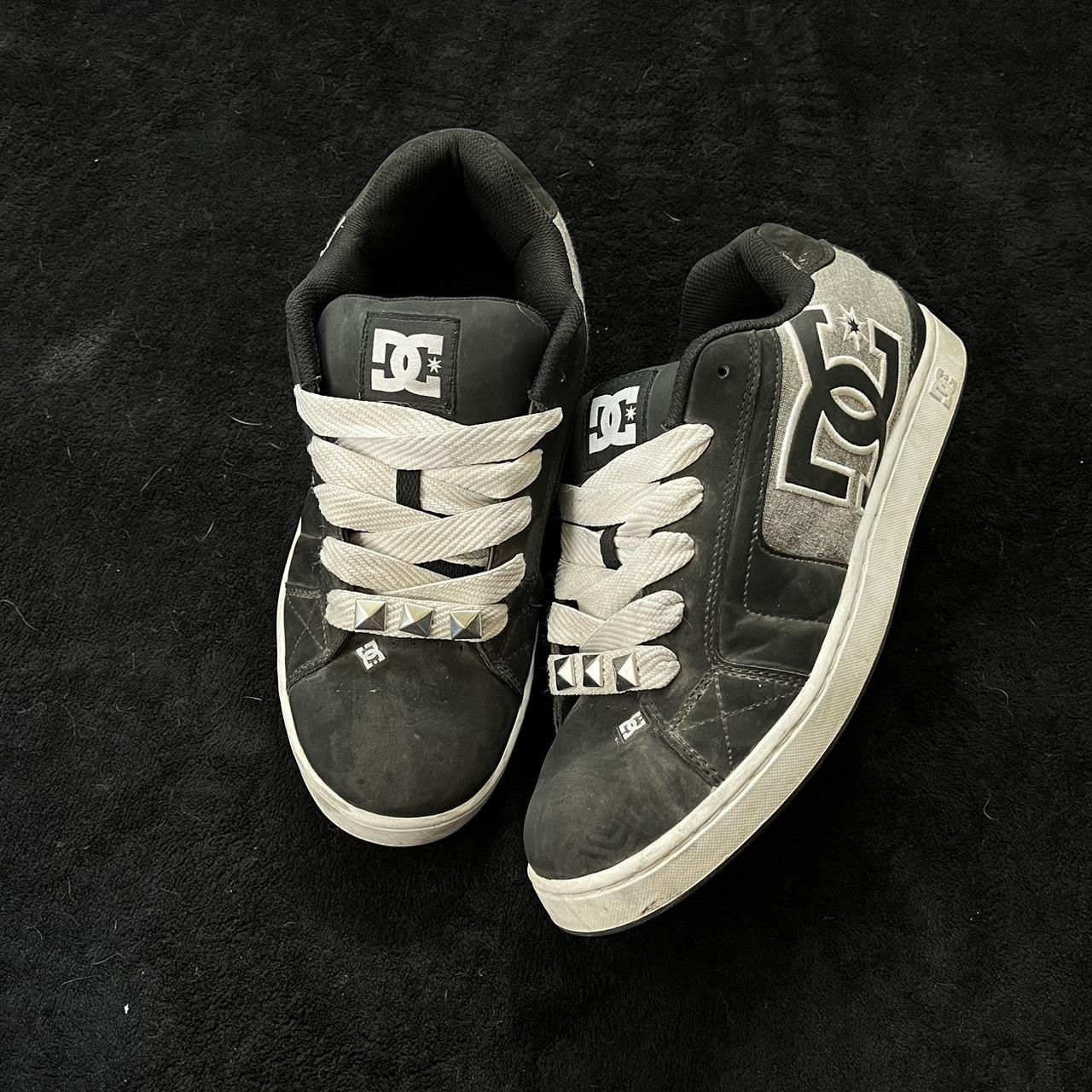 description: black and gray dc skate shoes w white... - Depop