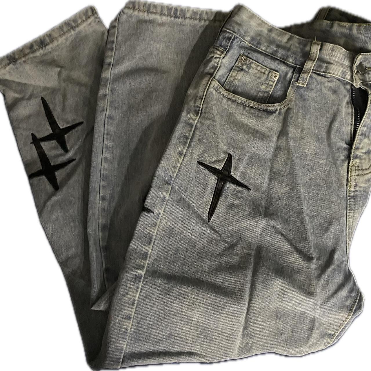 Grey and black jeans with cross designs on... - Depop