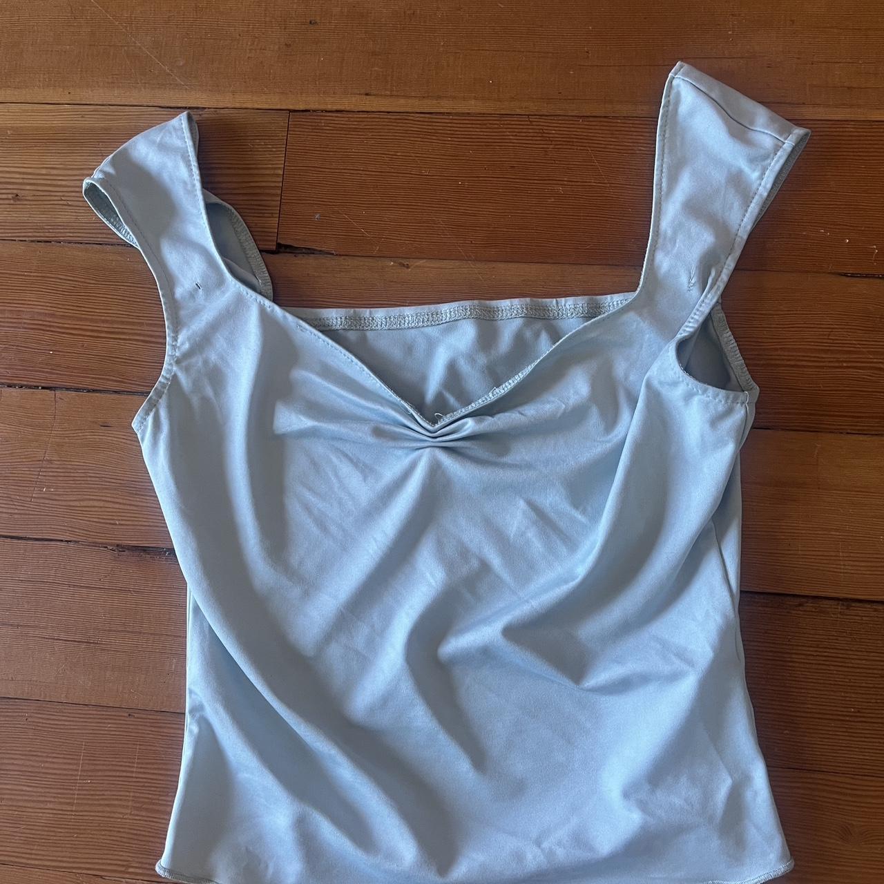 Light blue top The cinched part on chest is really... - Depop
