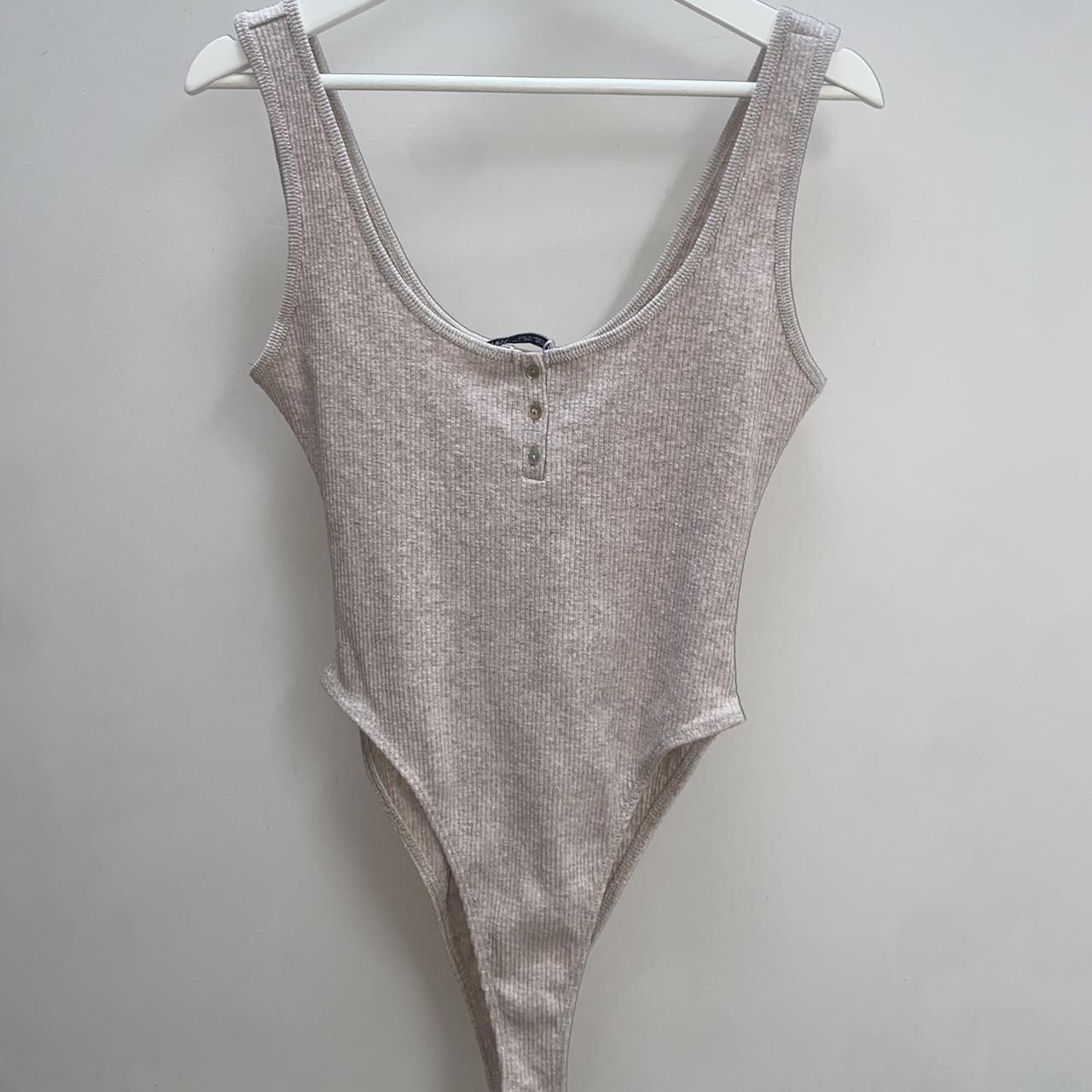 Zara Ribbed Nude Bodysuit w/ clasp opening at the... - Depop