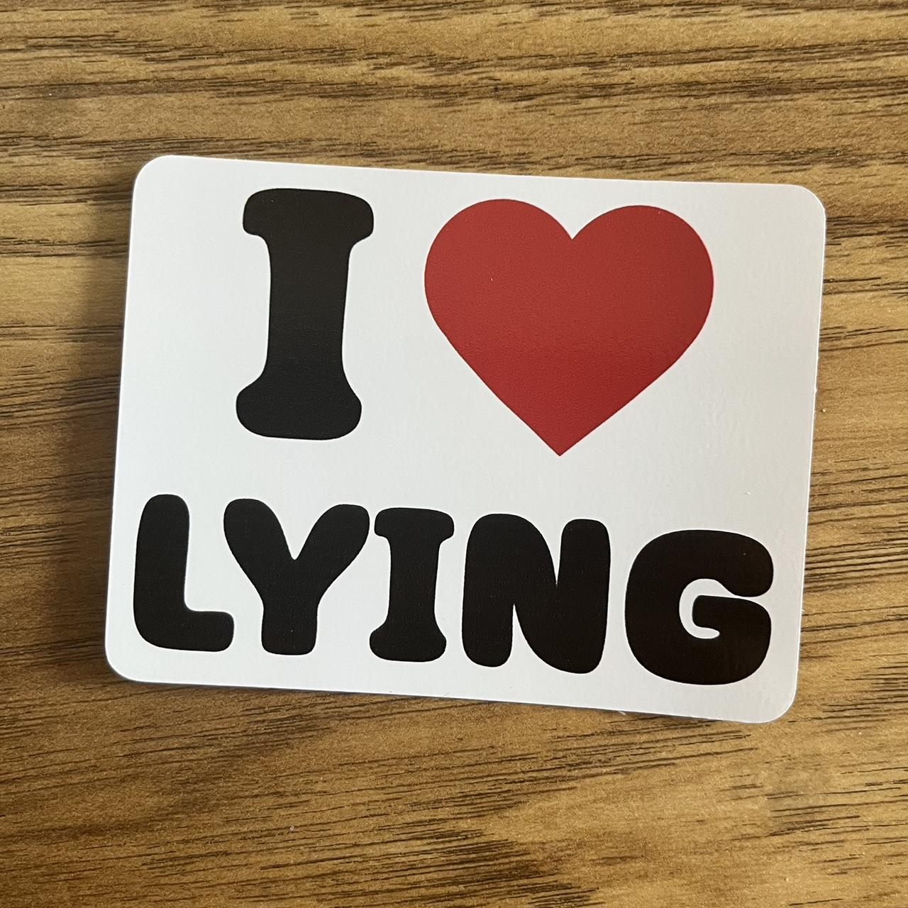 ‘I heart lying’ funny sticker! Featuring a white... - Depop