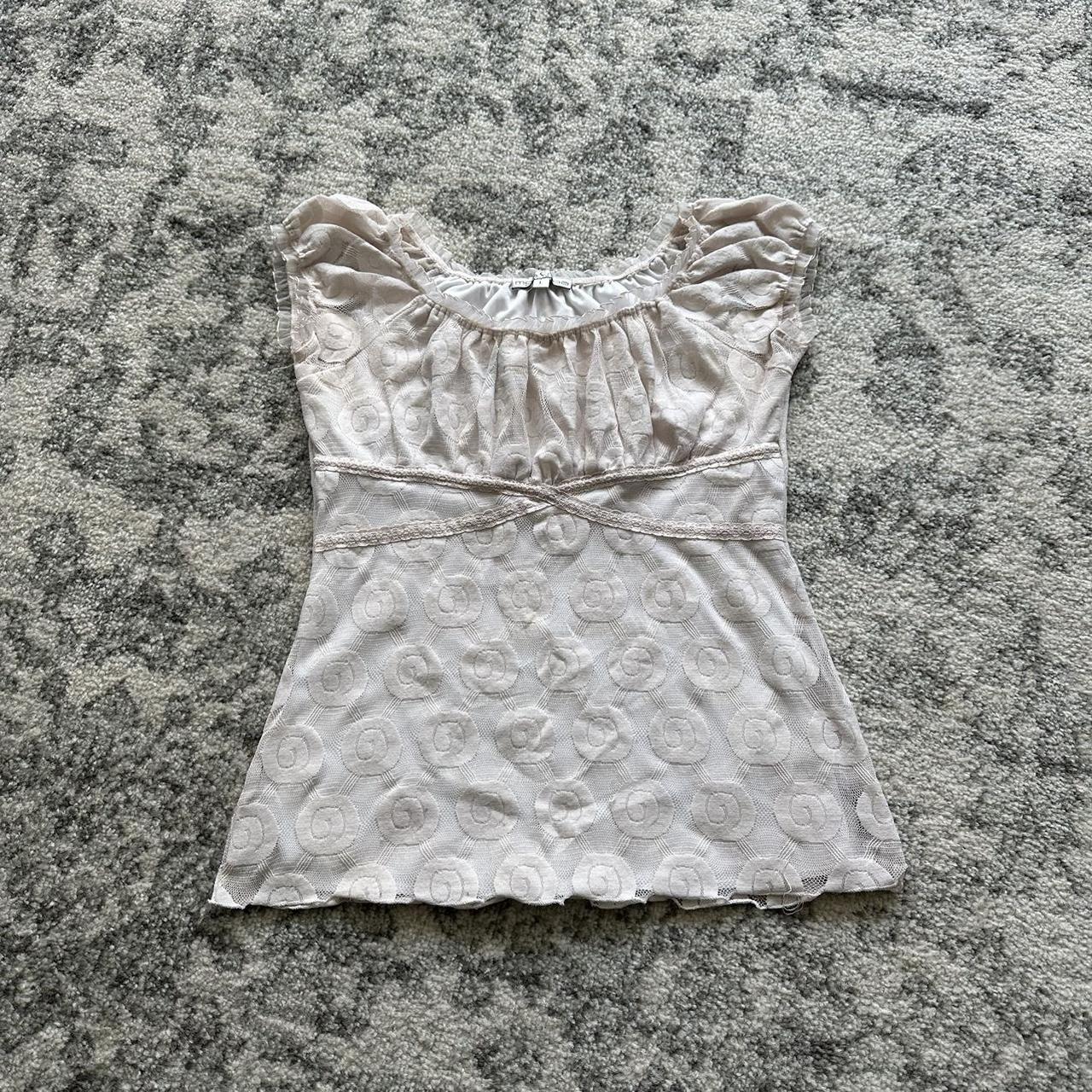 The sweetest cream and white ruffle top with a cute... - Depop