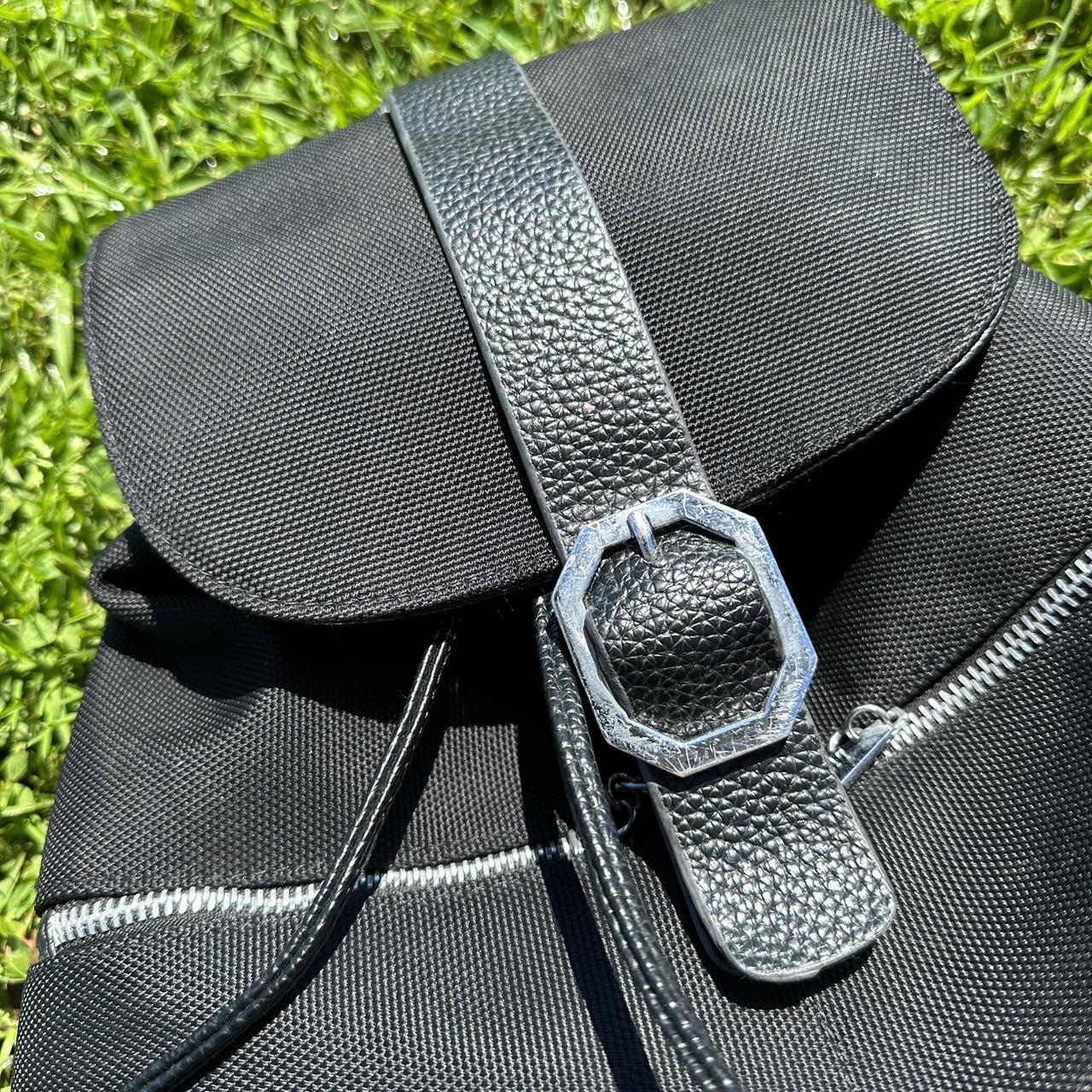 Super cute black mini backpack with silver details... - Depop