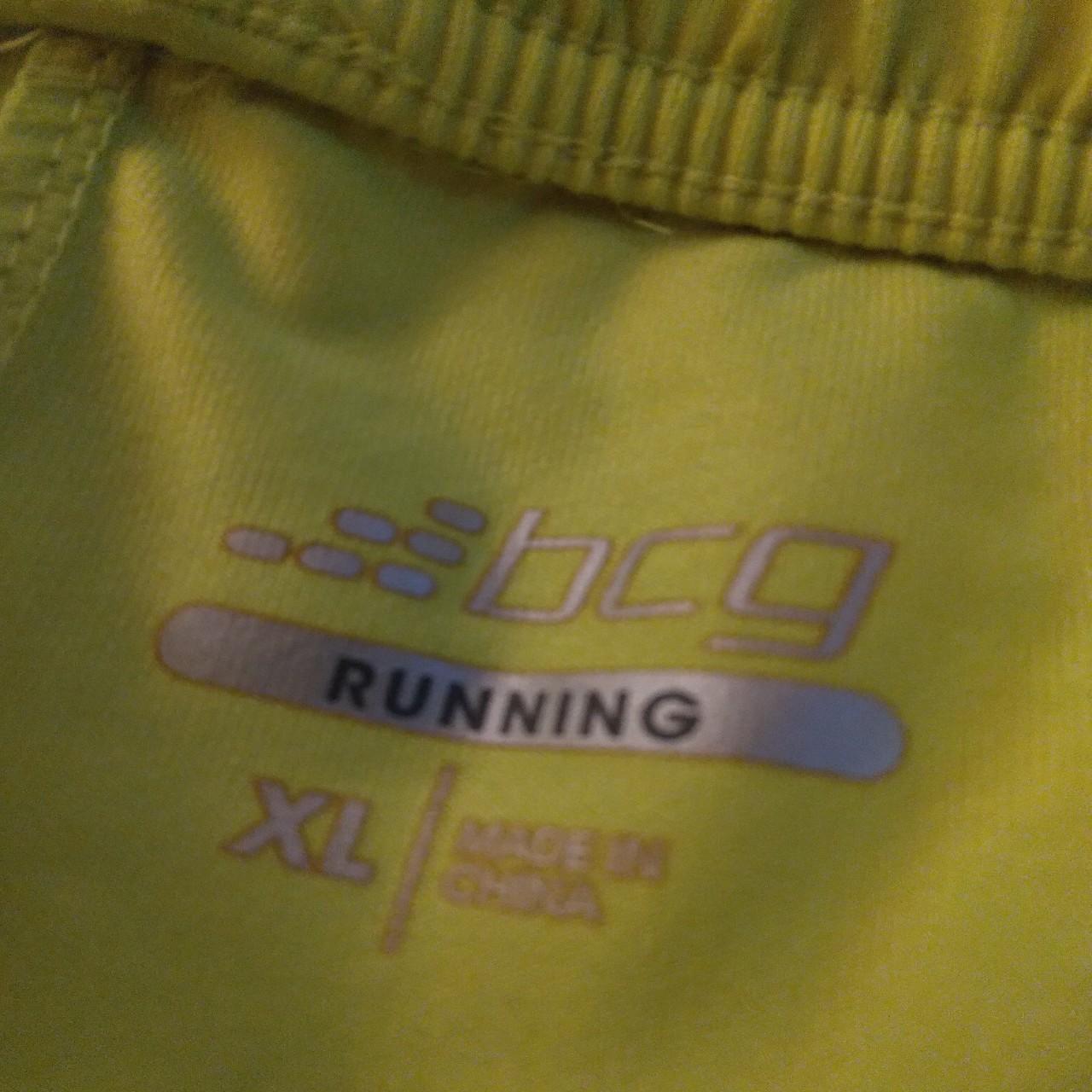 neon Yellow running shorts with built in underwear... | Depop