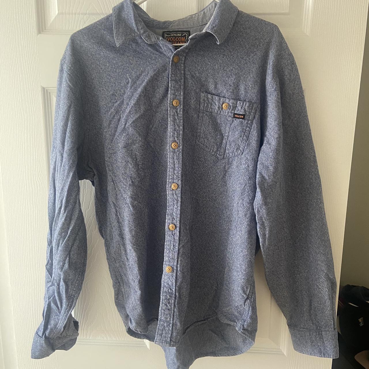 Volcom blue button down shirt. Small rip in left... - Depop