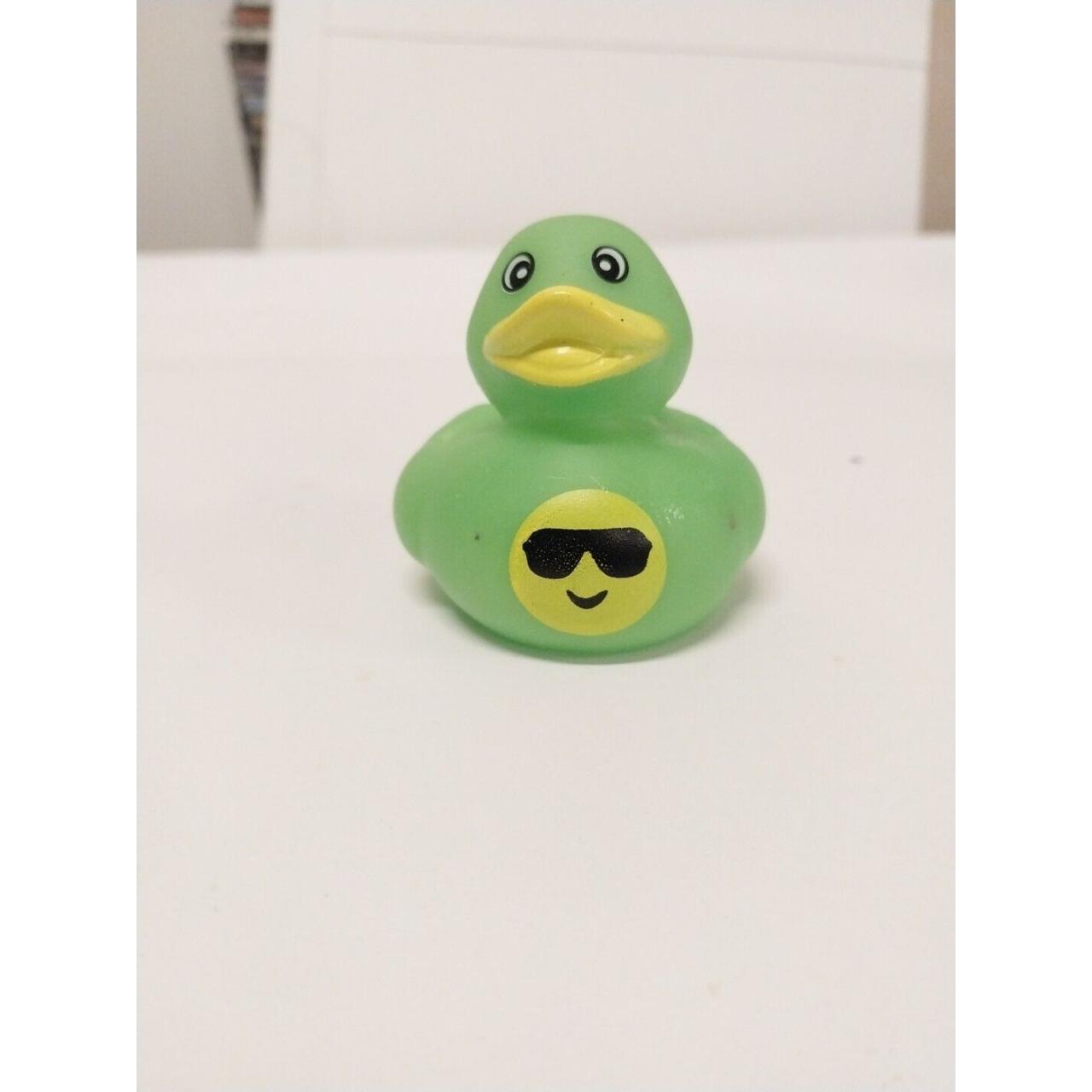 This adorable Green Smileface rubber duck is the... - Depop