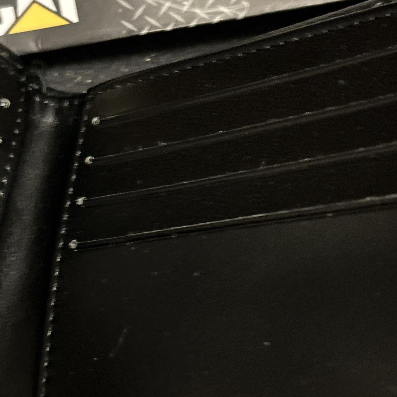 CAT Caterpillar Men's Leather Bifold Wallet Emboss... - Depop