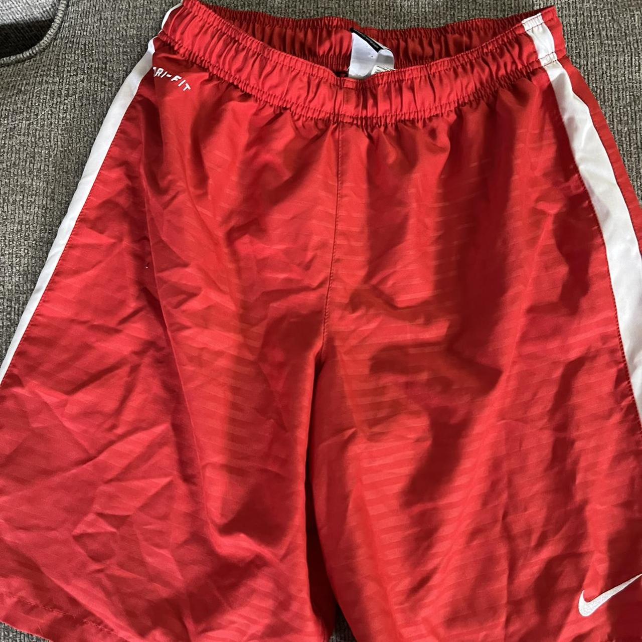red nike shorts | labeled m fit like small - Depop