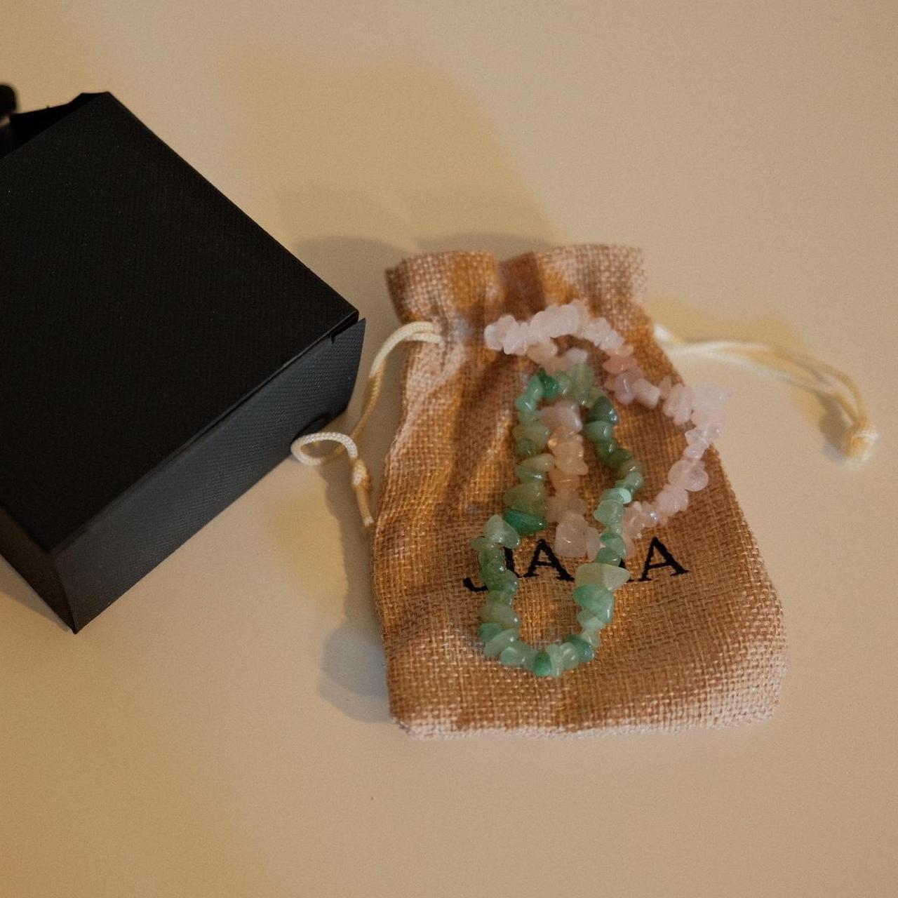 JIA JIA, a set of two bracelets are beaded with a... - Depop