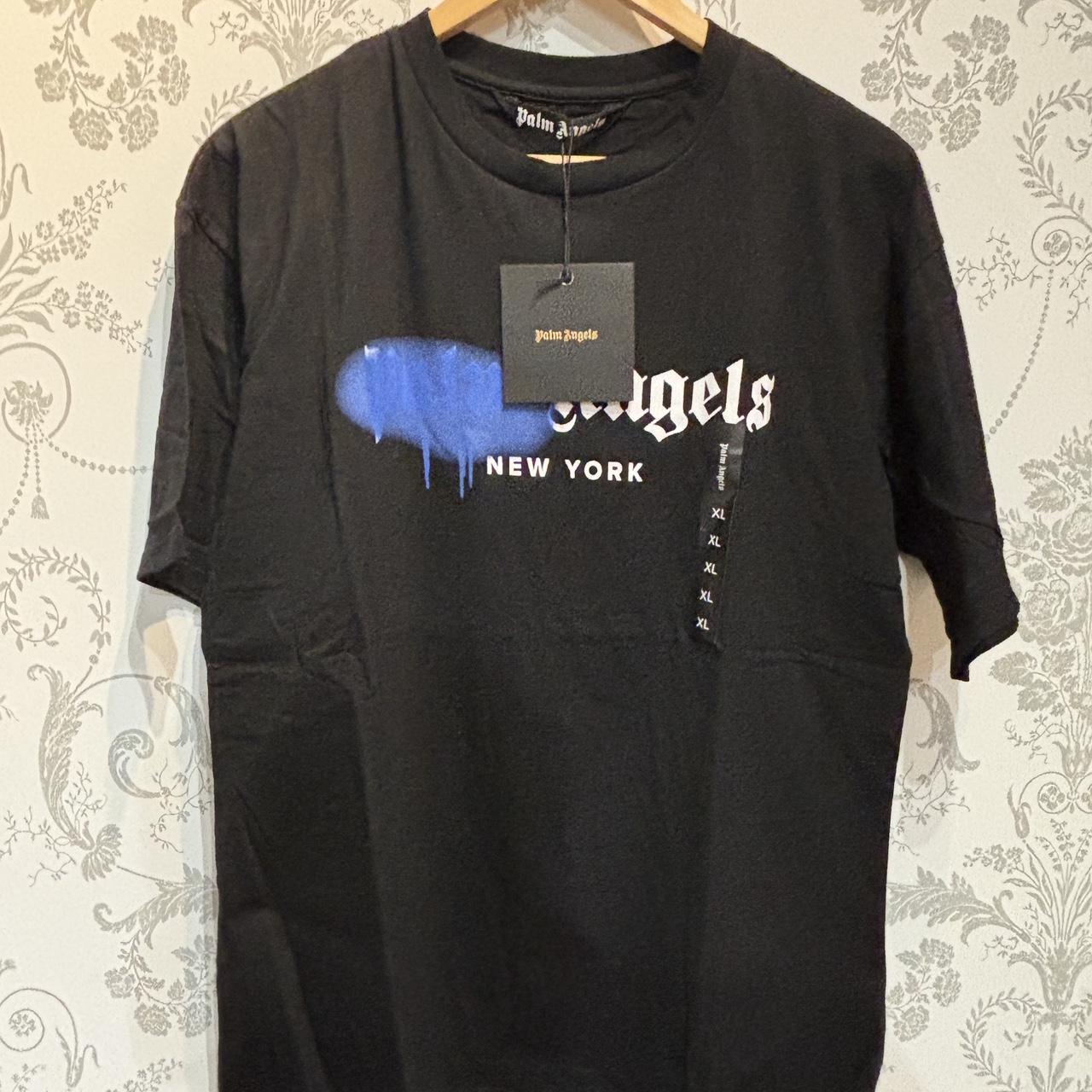 palm angles t-shirt black with blue spray paint size... - Depop