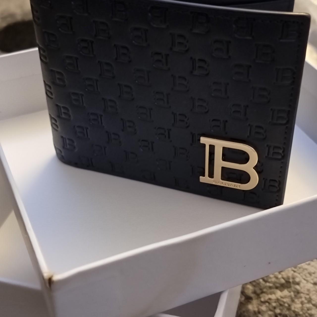 This Genuine Balmain Men's Black Leather Wallet is a... - Depop