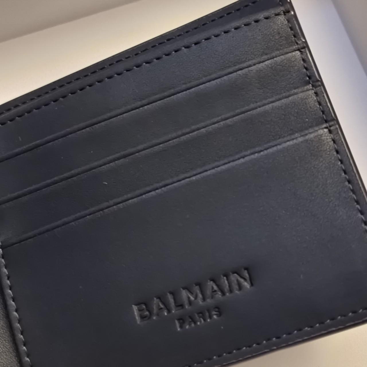 This Genuine Balmain Men's Black Leather Wallet is a... - Depop