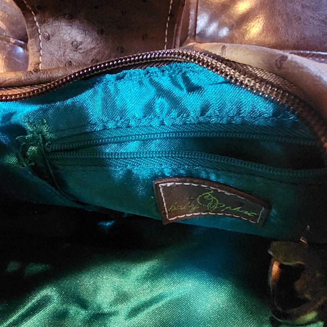 This Baby Phat Monogram shoulder bag is a stylish... - Depop