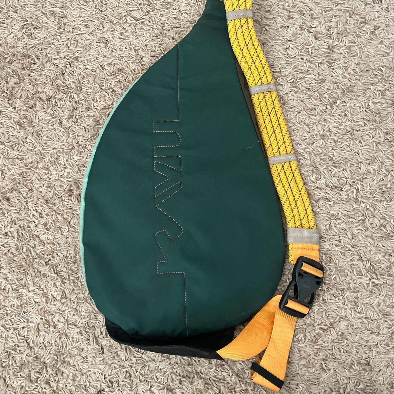 Brown and blue Kavu Sling bag. Has been used and had... - Depop