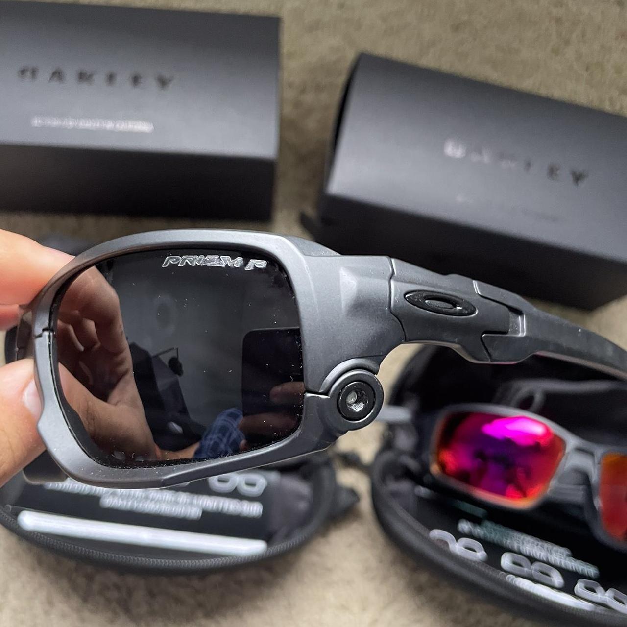 BRAND NEW 2 PAIR OF OAKLEYS COMES WITH CASE AND BOX... - Depop