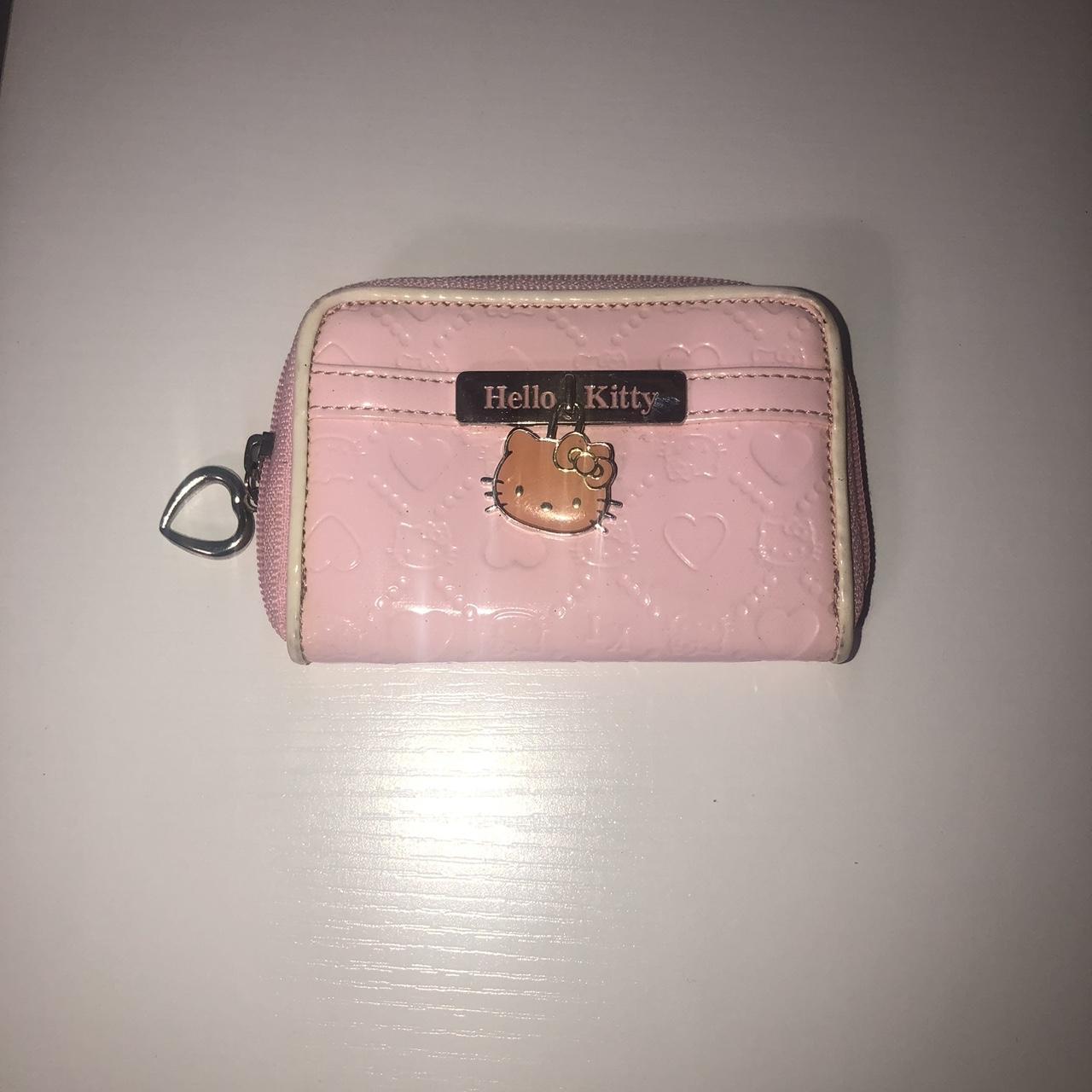 Super small pink hello kitty wallet. Dirty on the... | Depop
