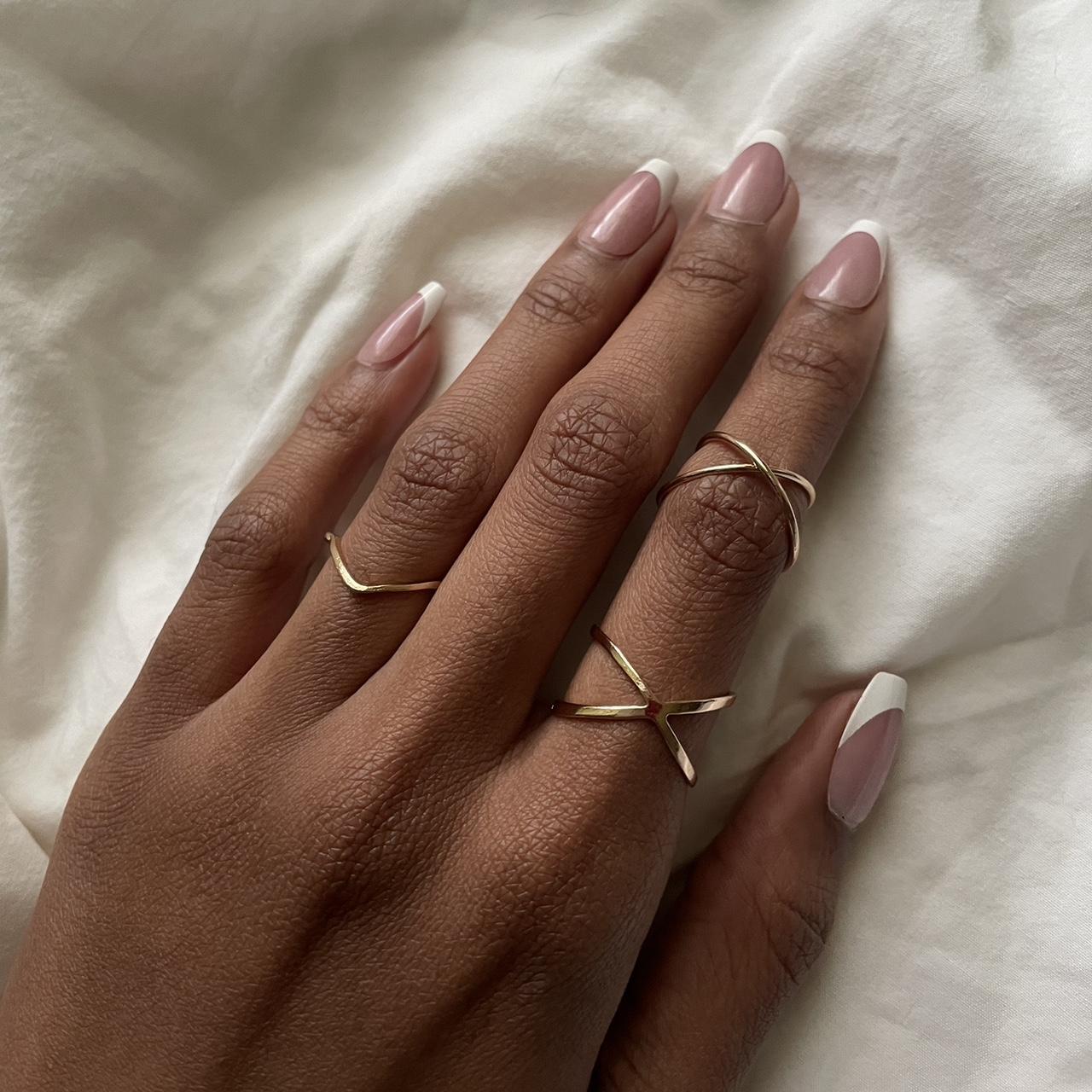 Women’s three-piece golden ring set. Sizing is shown... - Depop